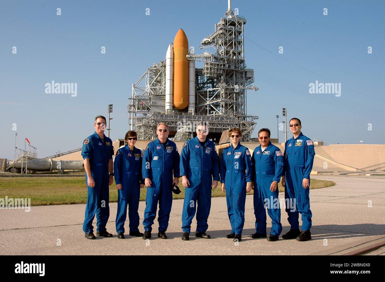 The STS-114 crew gathers at Launch Pad 39B for media briefing at ...