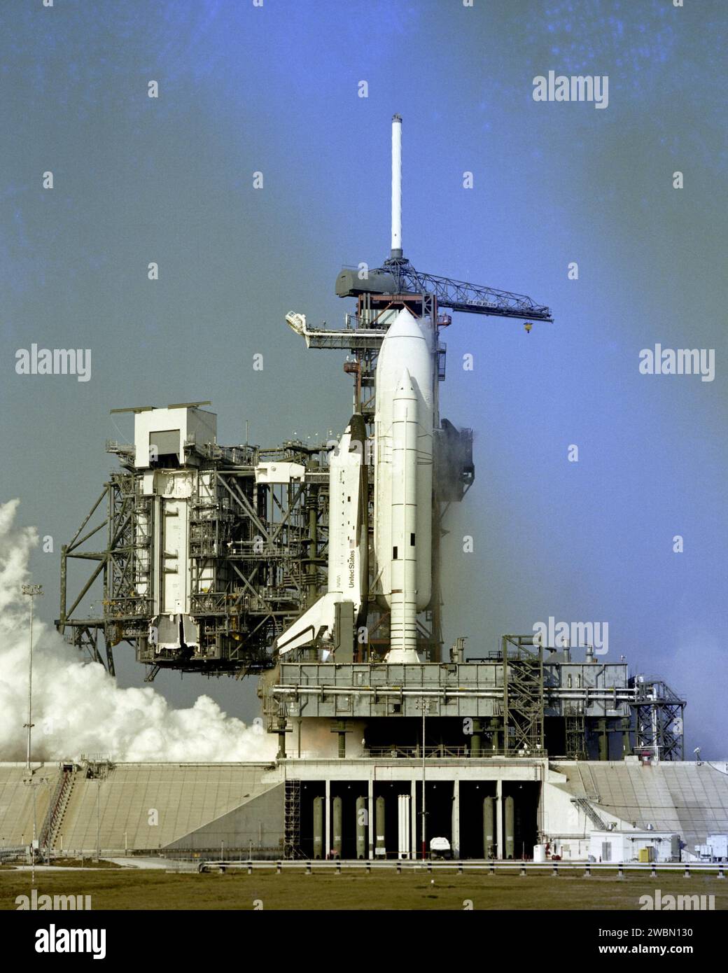 KENNEDY SPACE CENTER, FLA. - Flames shoot from the nozzles of Space ...
