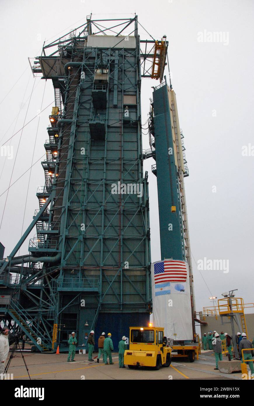 VANDENBERG AIR FORCE BASE, Calif. -- Workers attach an overhead crane ...