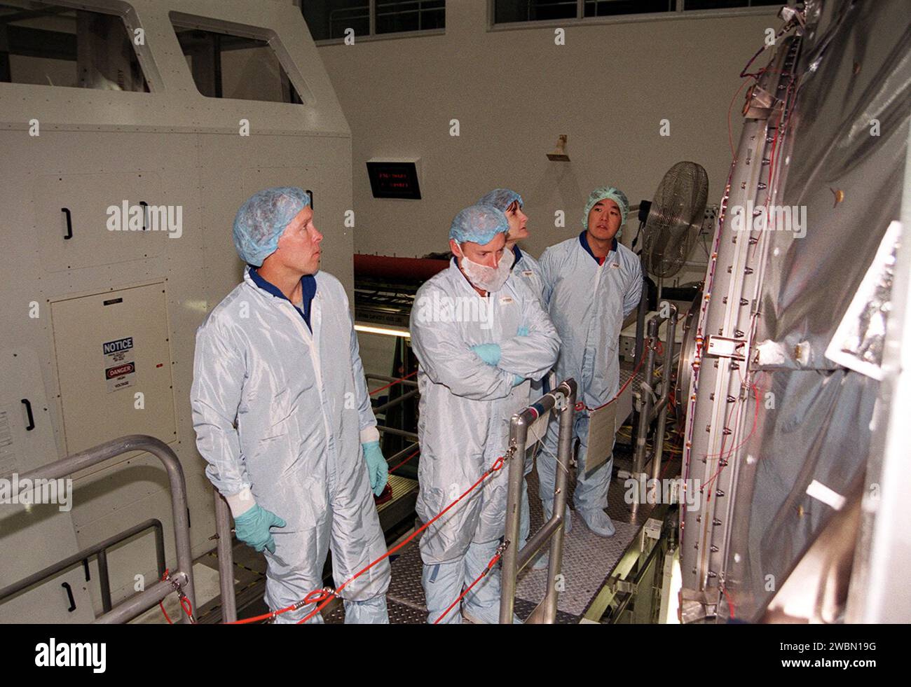 KENNEDY SPACE CENTER, Fla. -- The STS-108 crew look into the hatch of ...