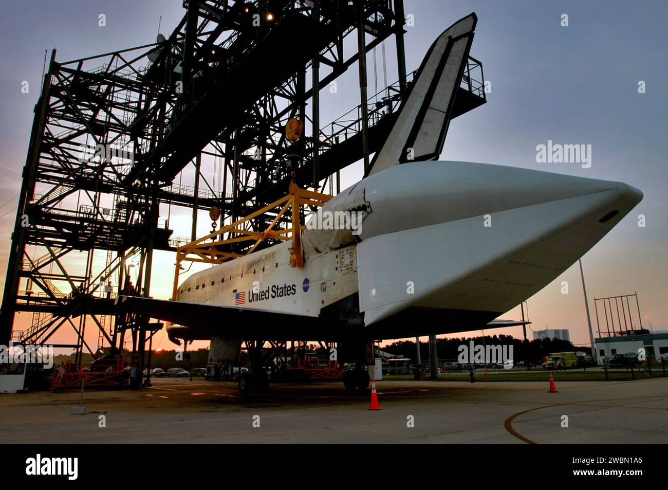 KENNEDY SPACE CENTER, FLA. - Just before sunrise, Discovery finally rests on its wheels on the ...