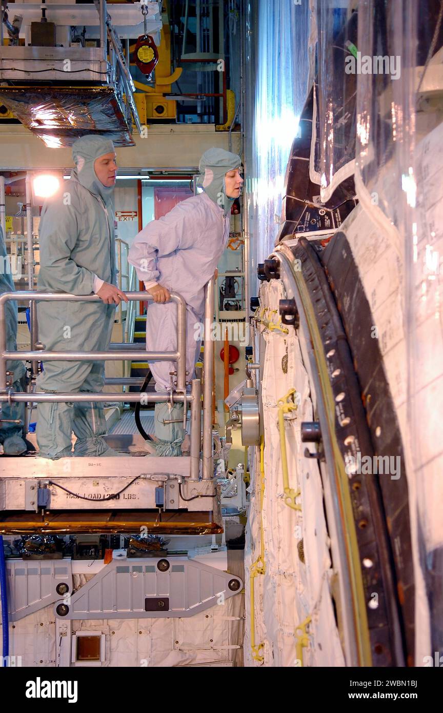 KENNEDY SPACE CENTER, FLA. - In the Orbiter Processing Facility, STS-114 Commander Eileen ...