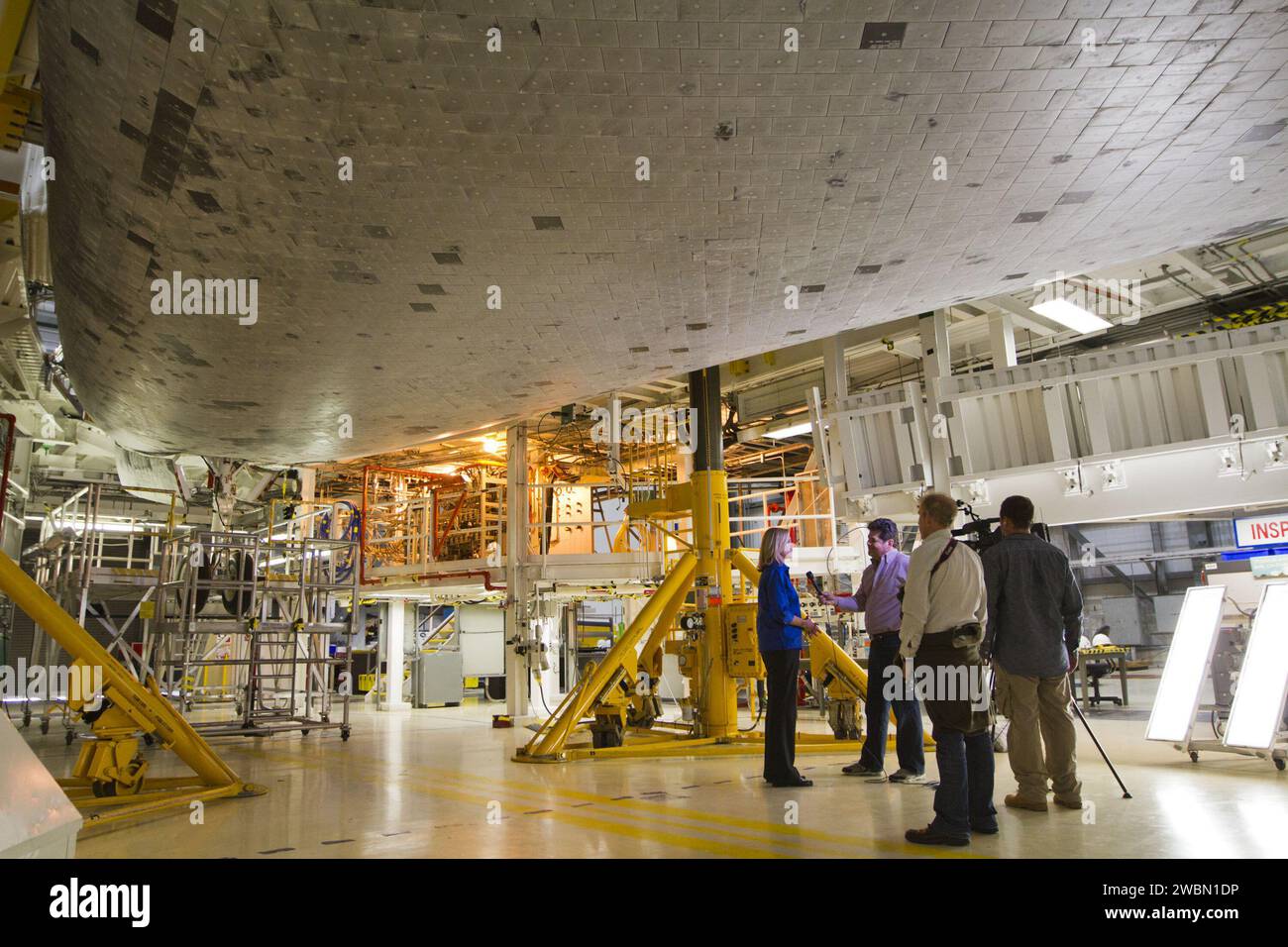 CAPE CANAVERAL, Fla. -- Standing beneath the midbody of space shuttle ...