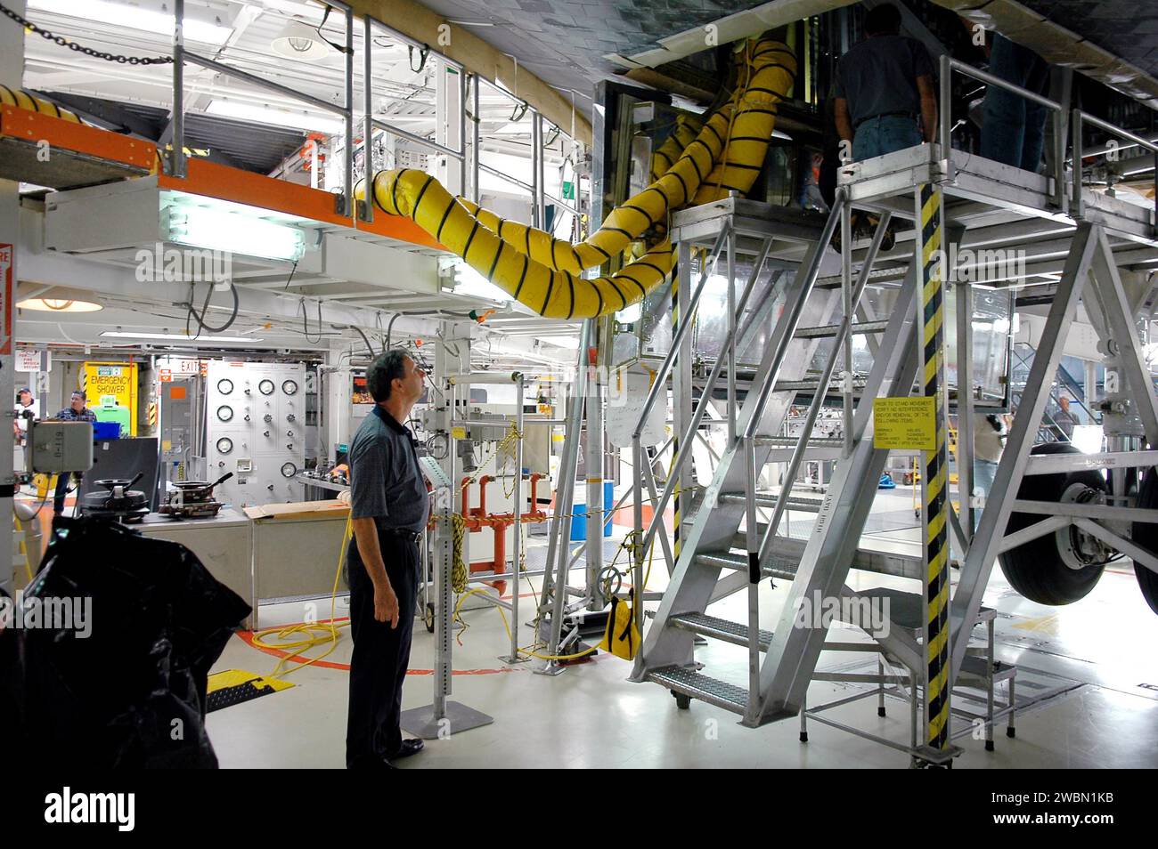 NASA Administrator Michael Griffin observed technicians preparing Space ...