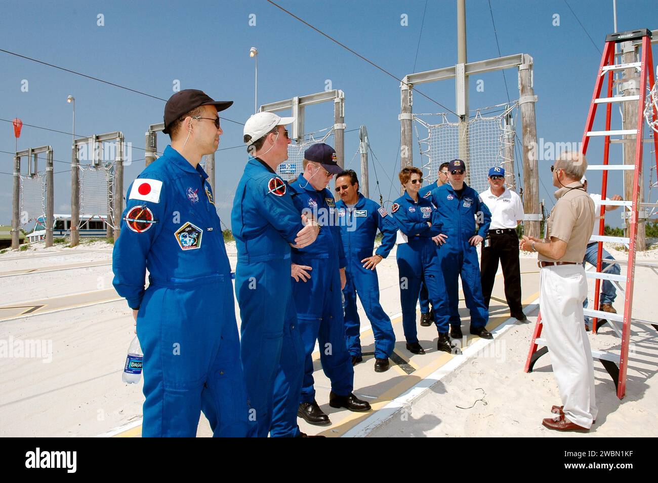 STS-114 crew trained at Kennedy Space Center using slidewire baskets ...