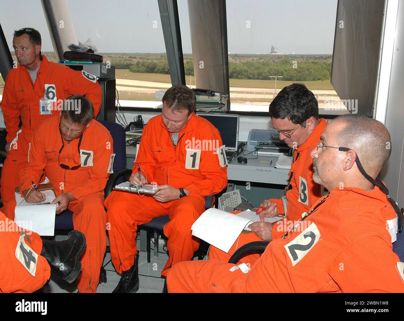 KENNEDY SPACE CENTER, FLA. - Members of the Final Inspection Team ...