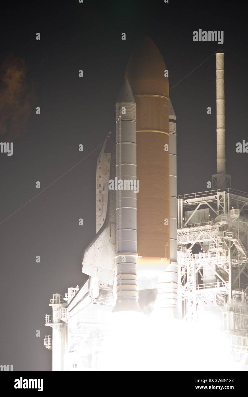 CAPE CANAVERAL, Fla. - Space shuttle Discovery begins its ascent into ...