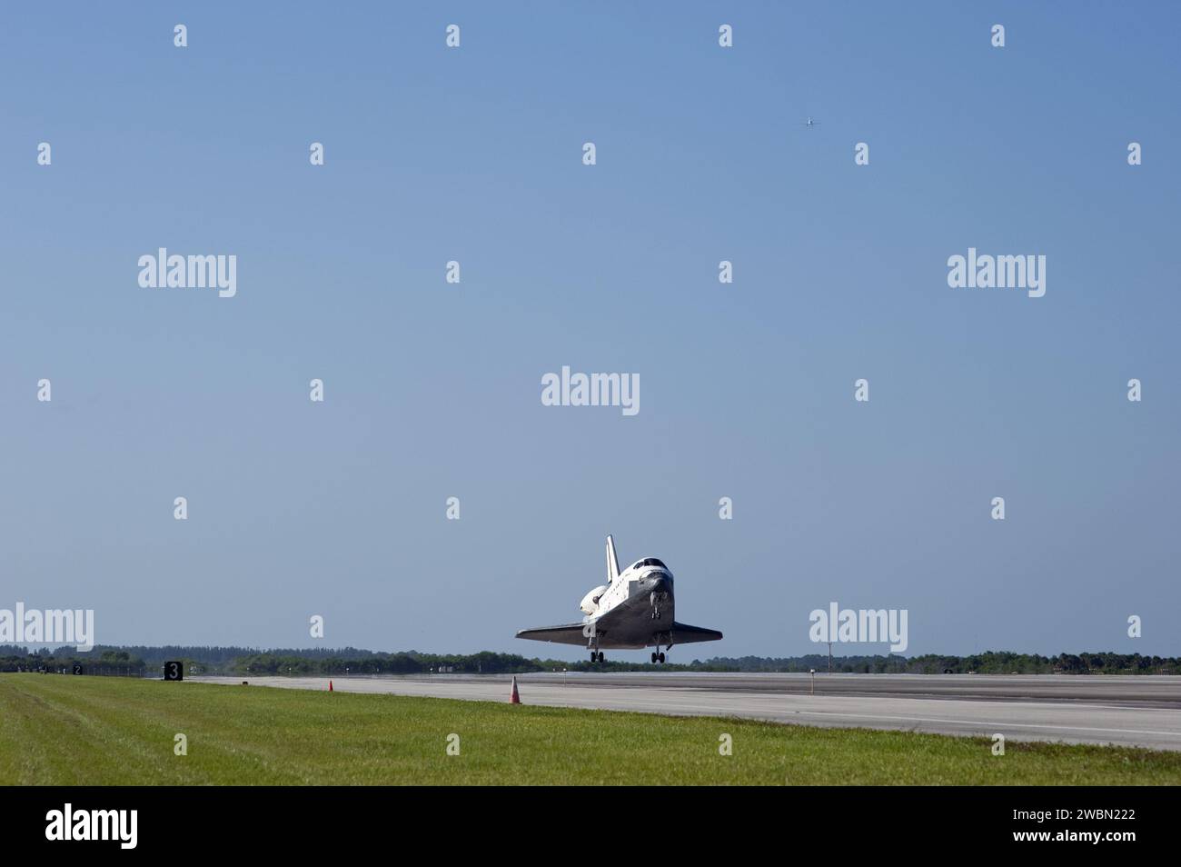 CAPE CANAVERAL, Fla. - A Shuttle Training Aircraft, or STA, top right ...