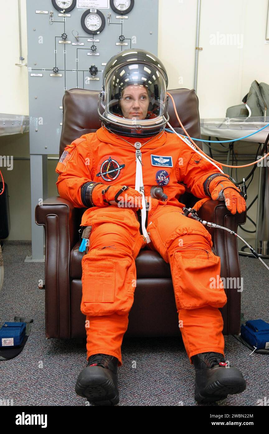 KENNEDY SPACE CENTER, FLA. -STS-114 Commander Eileen Collins suits up ...