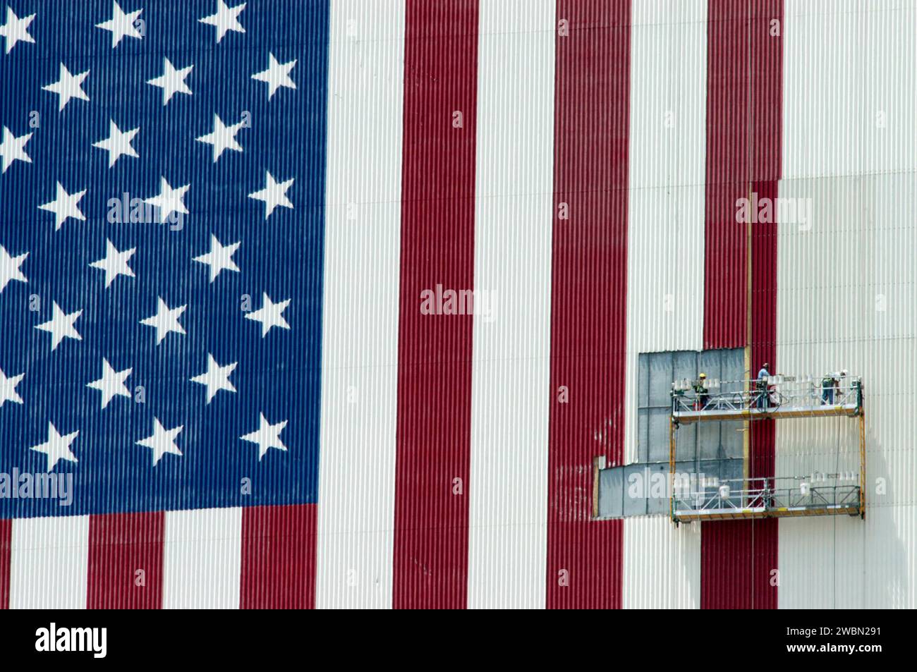 Painters began repainting the American flag on Kennedy Space Center’s ...