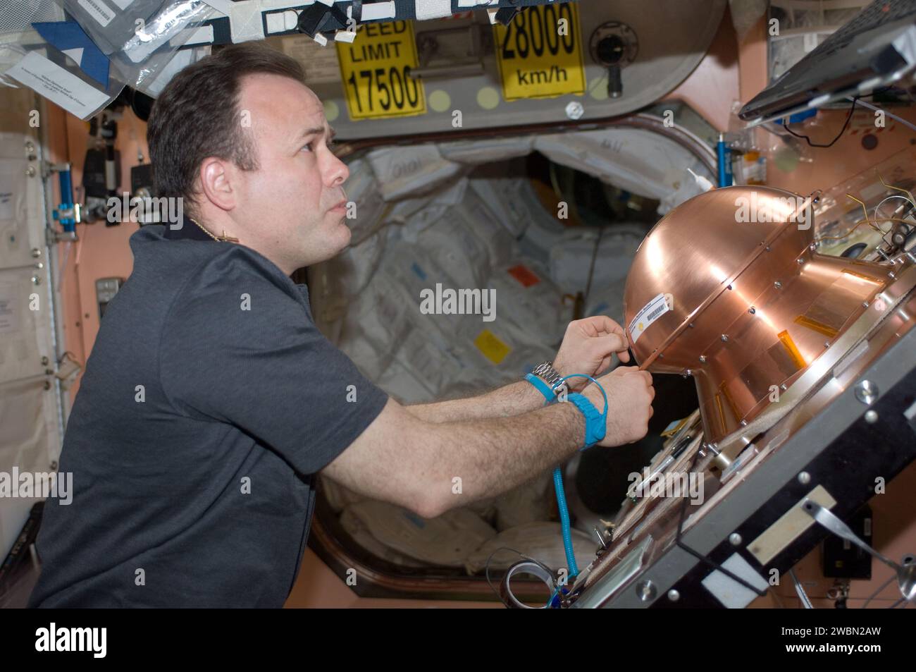 Ron Garan, NASA astronaut and Expedition 28 flight engineer, installs ...
