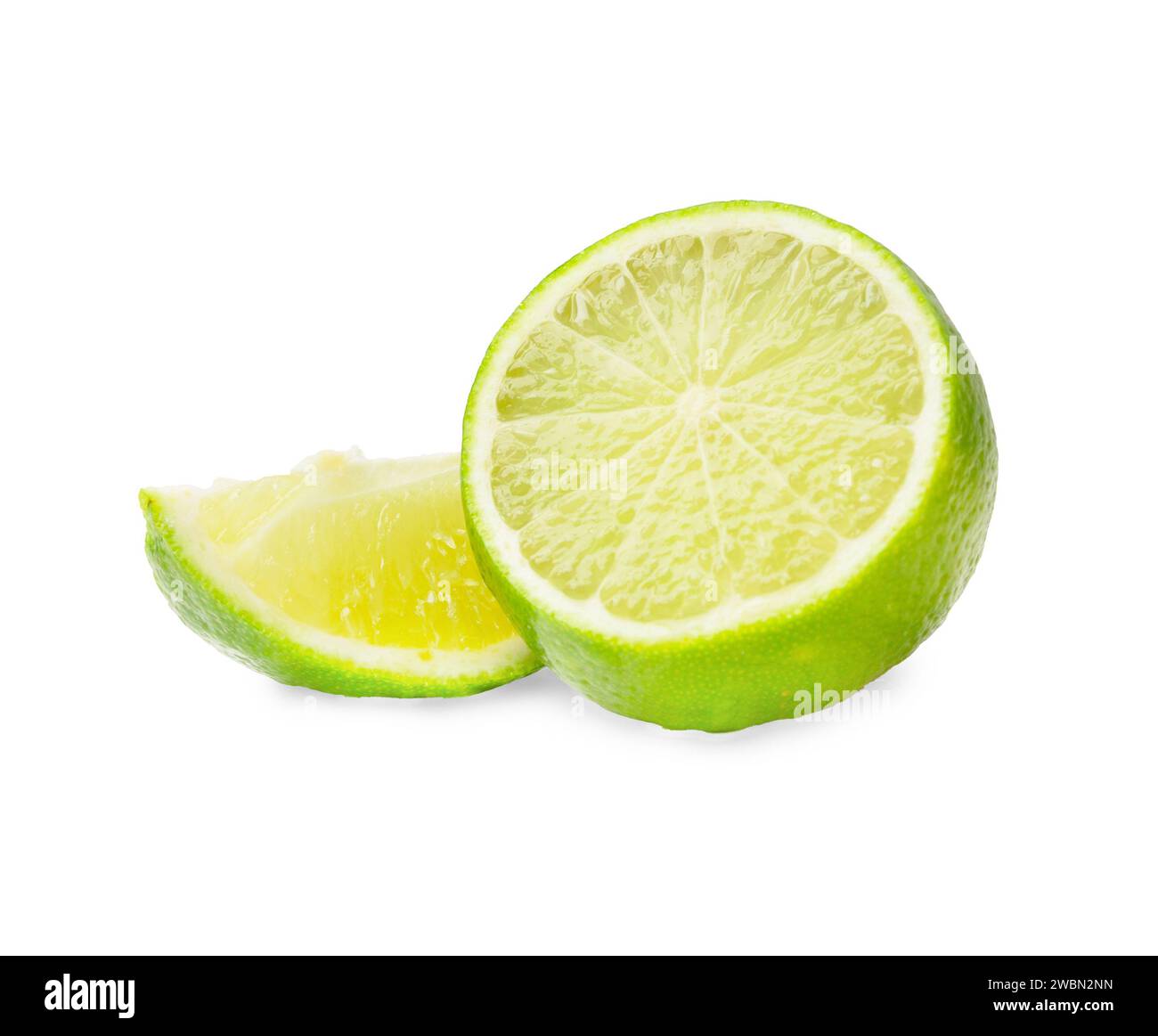 Half and slice of juicy fresh lime isolated. Lime on a transparent ...