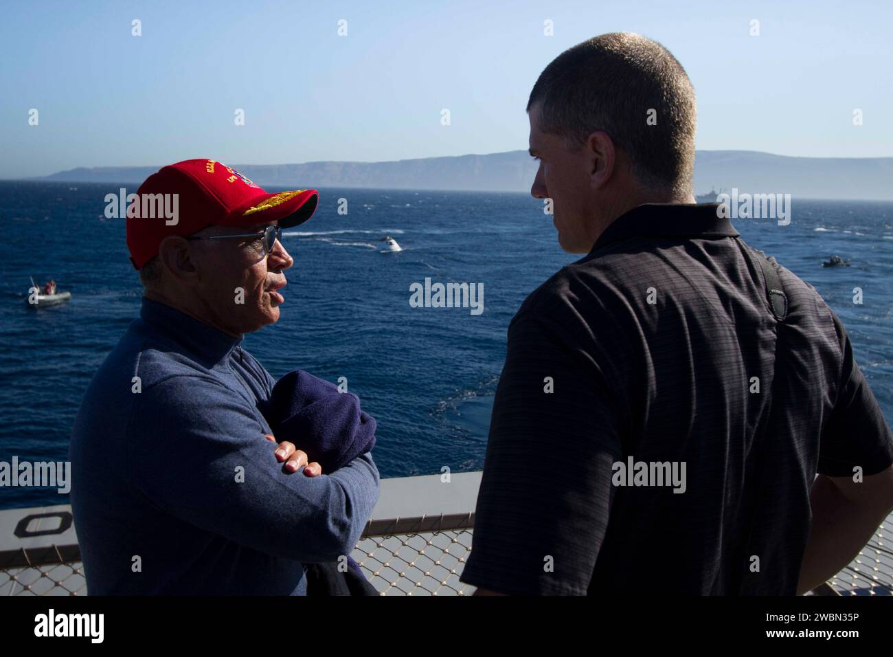 NASA Administrator Charles Bolden talks with a member of the Orion ...