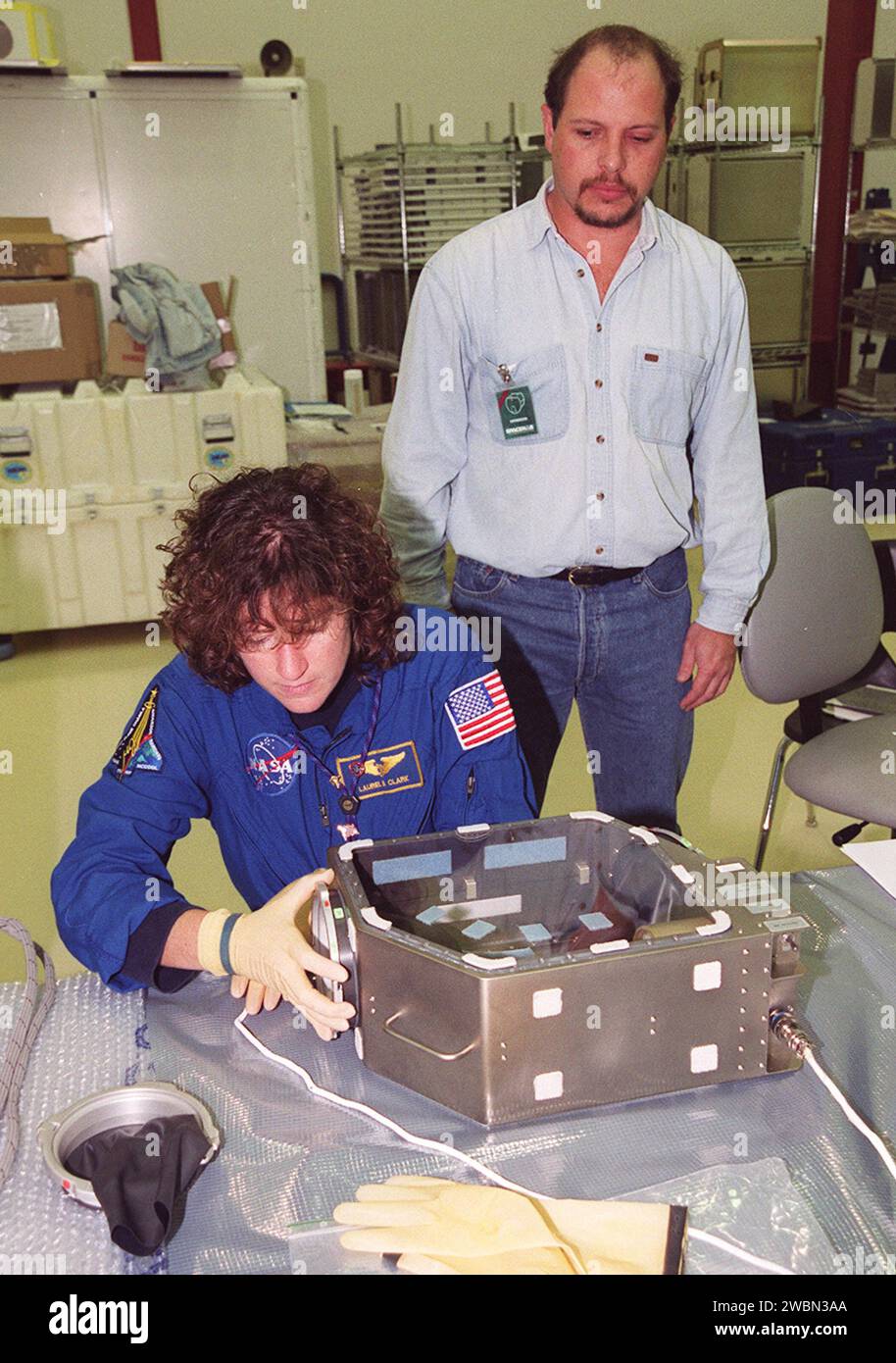 KENNEDY SPACE CENTER, Fla. -- Under the watchful eyes of a trainer at ...