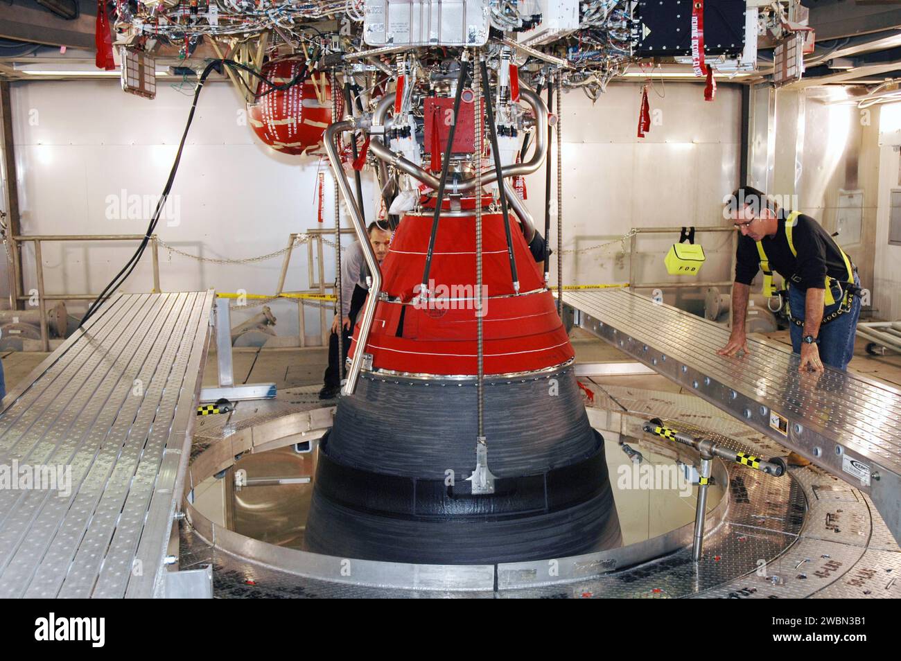 Technician monitors boeing delta iv second stage nozzle operations ...