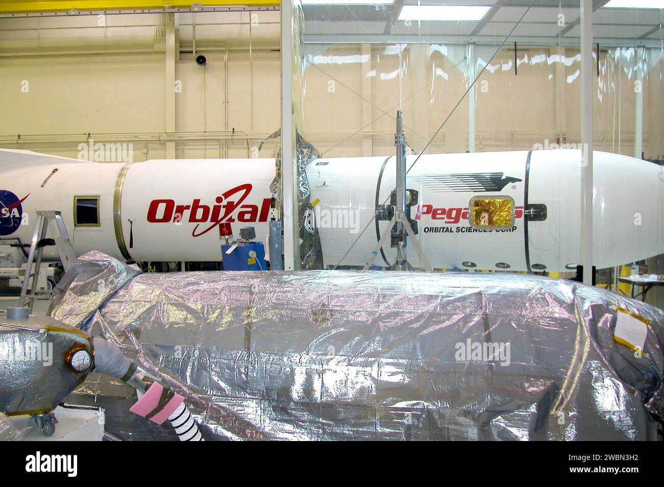 The DART spacecraft, built by Orbital Sciences for NASA, was prepared ...