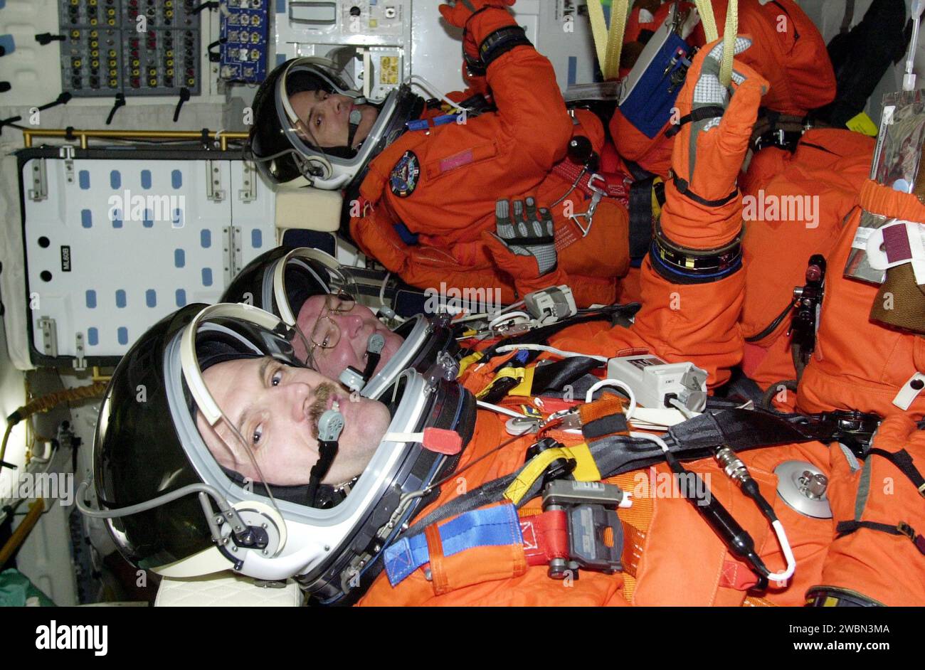 KENNEDY SPACE CENTER, FLA. -- (Left to right) STS-110 Mission ...