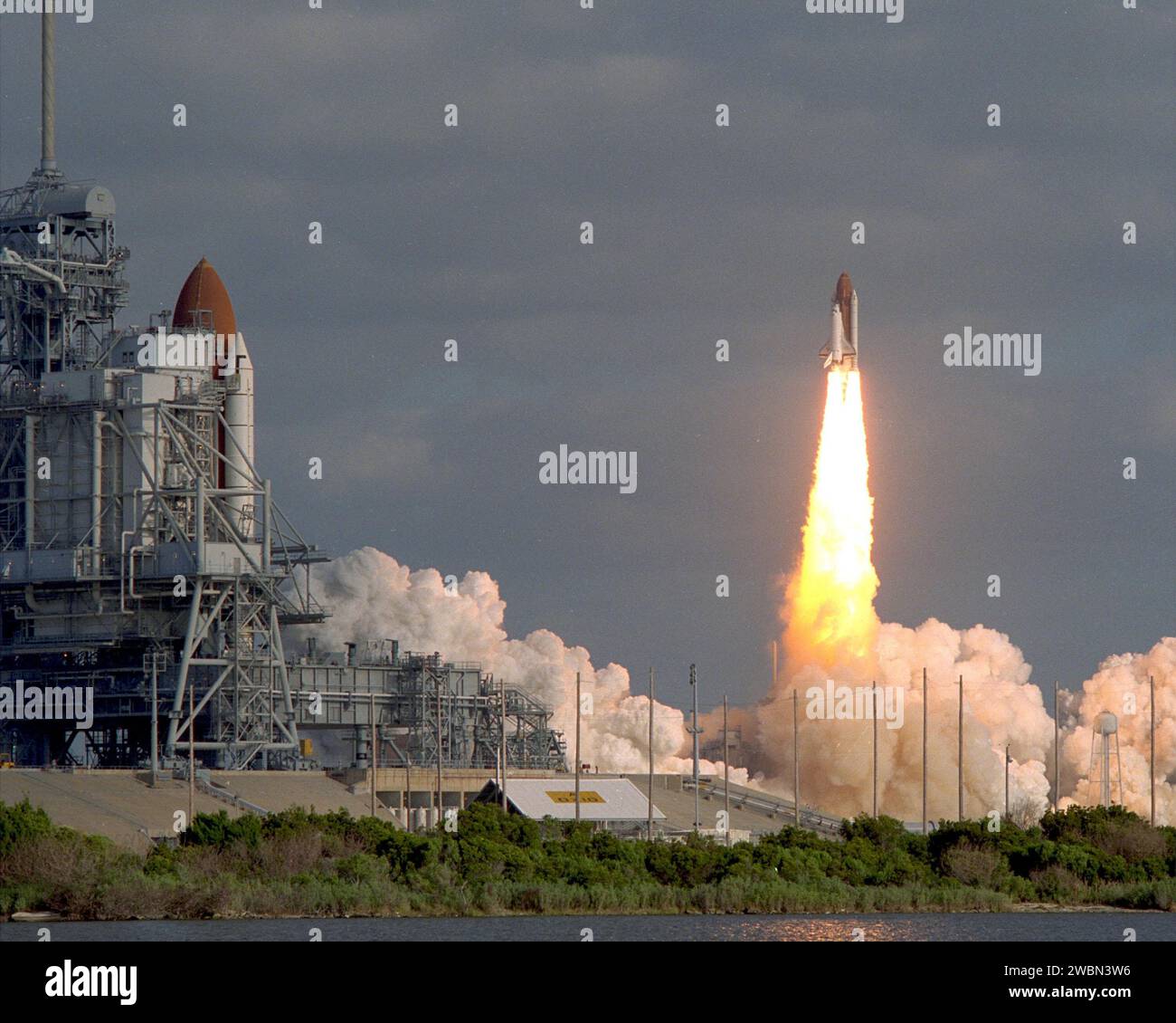 At Kennedy Space Center, Space Shuttle Columbia stands on Pad 39A while ...