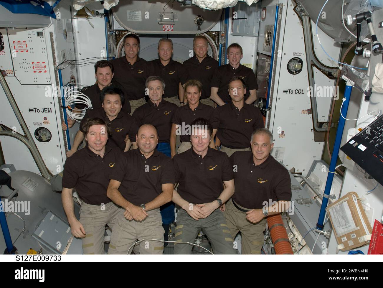 S127-E-009733 (28 July 2009) --- The STS-127 and Expedition 20 crew ...