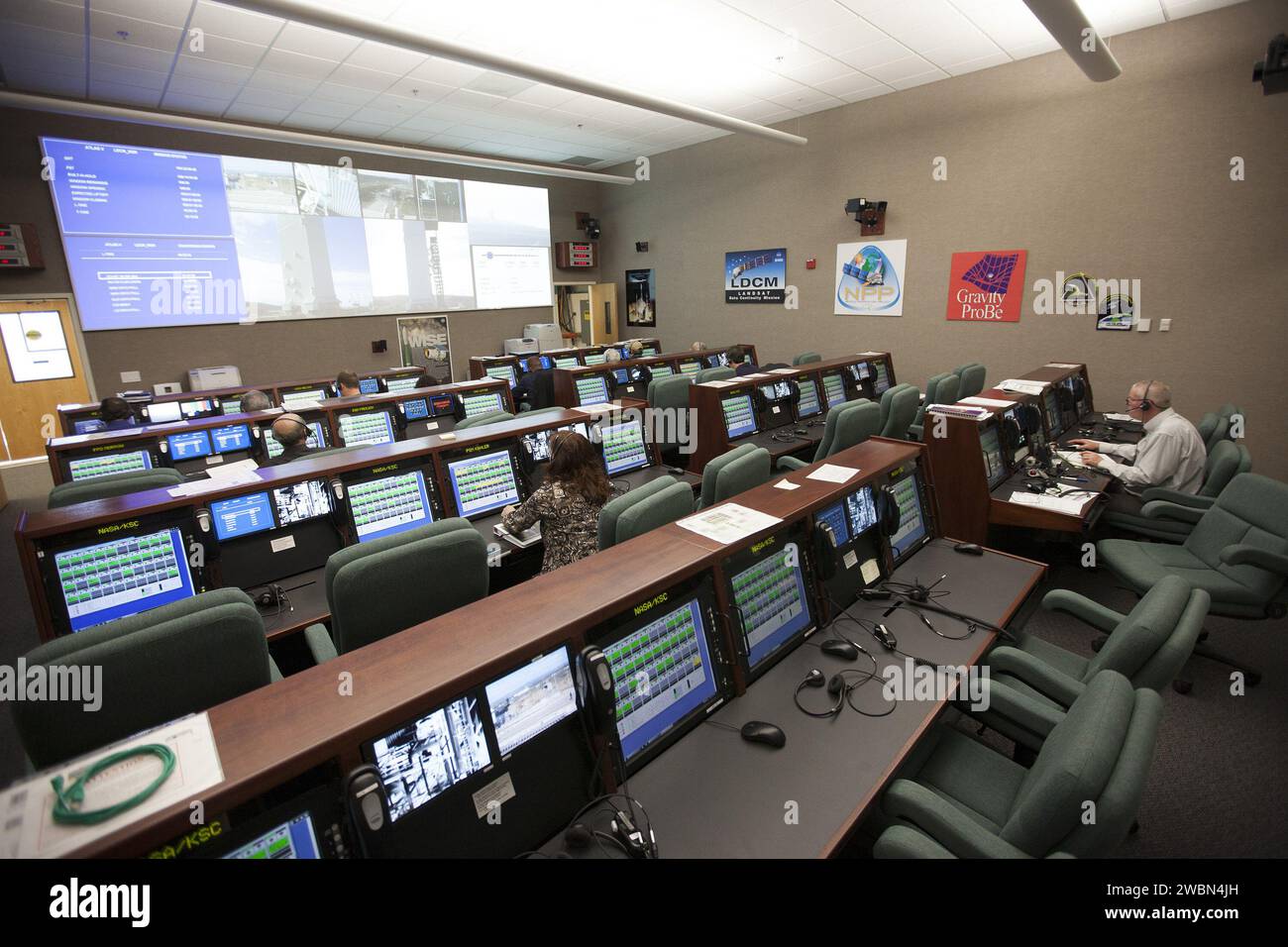 VANDENBERG AFB, Calif. -- From their consoles in the Mission Director's ...