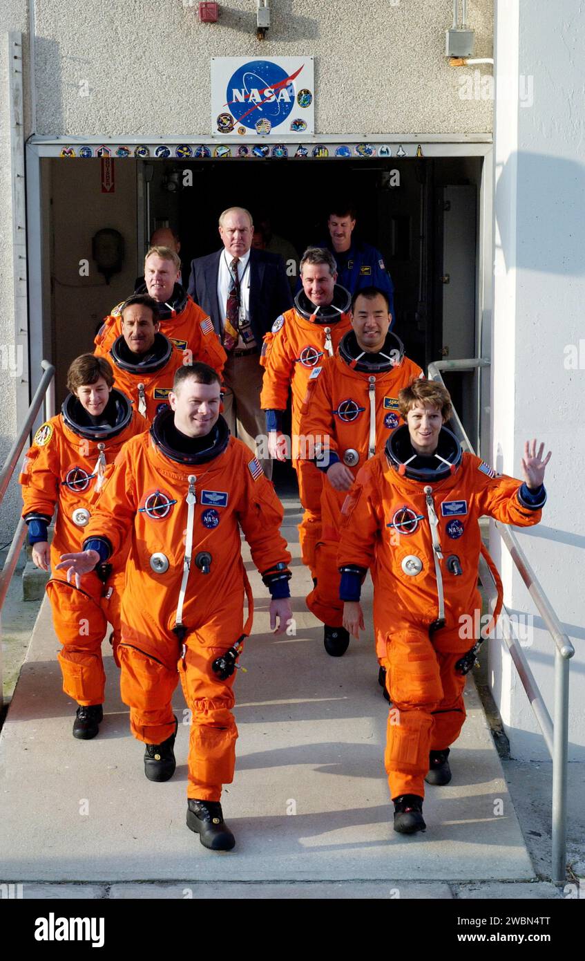 KENNEDY SPACE CENTER, FLA. - STS-114 Commander Eileen Collins leads the ...