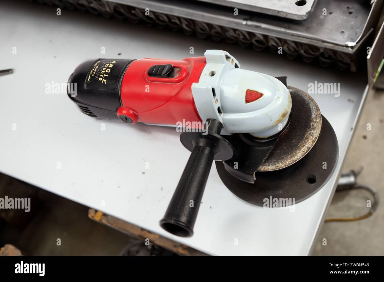 Hand-held Electric Angle-Grinder against a white background Stock Photo ...