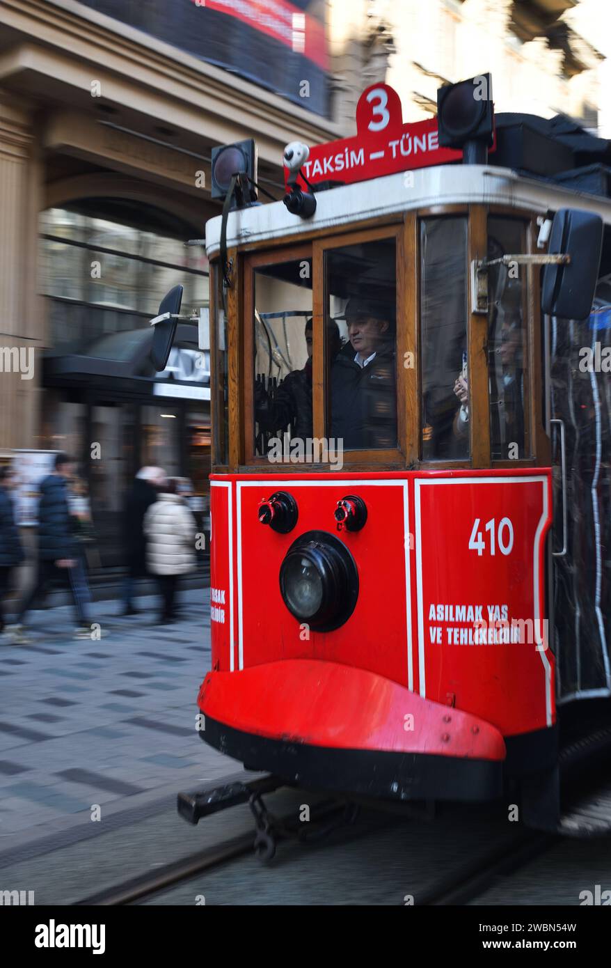 Istanbul, Turkey - December 10, 2023: Historic red tram carrying people ...