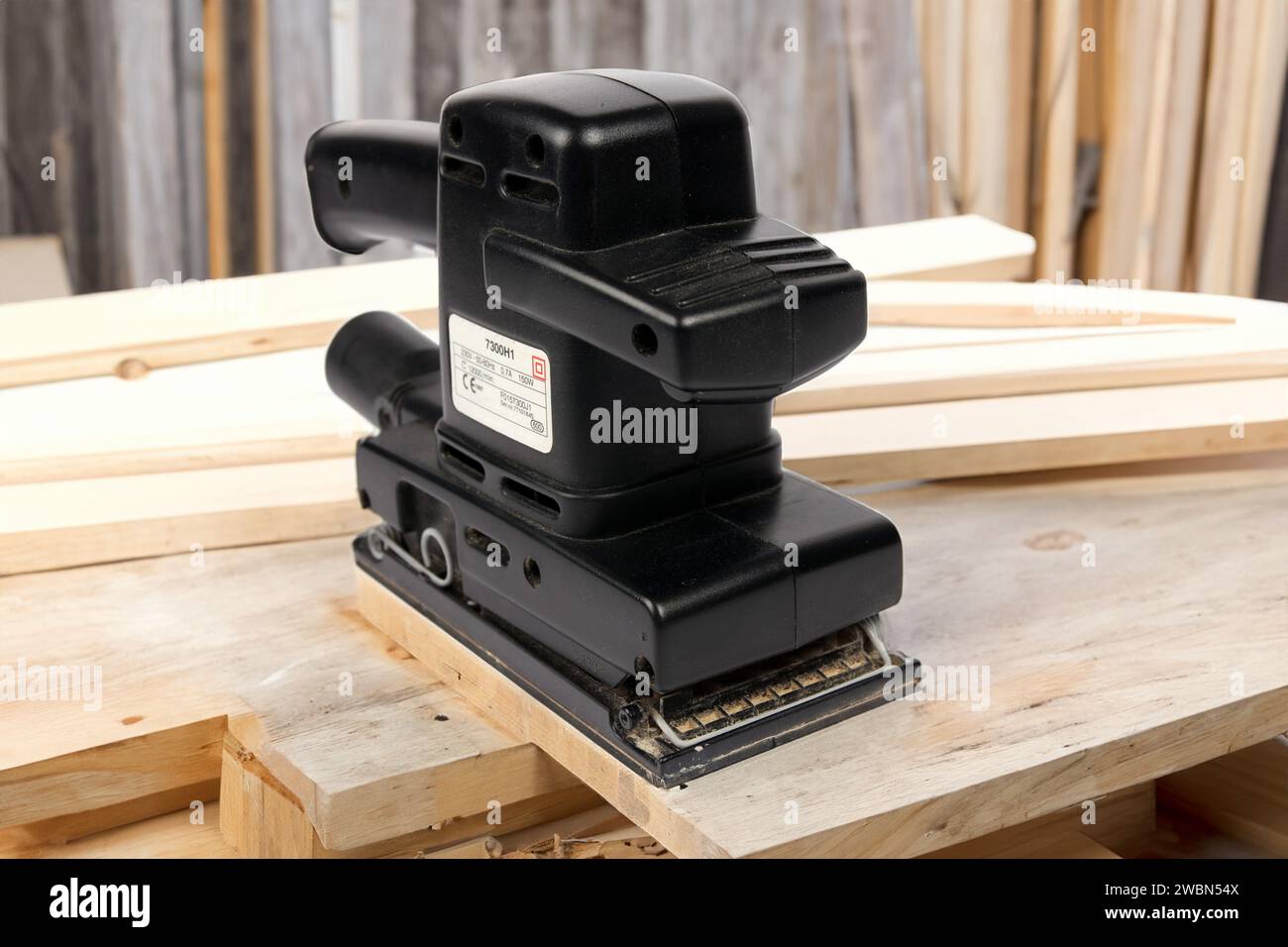 Hand-held Electric Sheet Sander against a white background Stock Photo ...