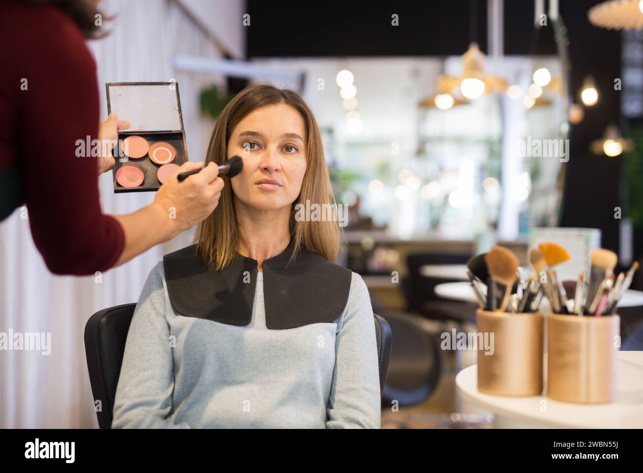 Woman blushing hands face hi-res stock photography and images - Alamy