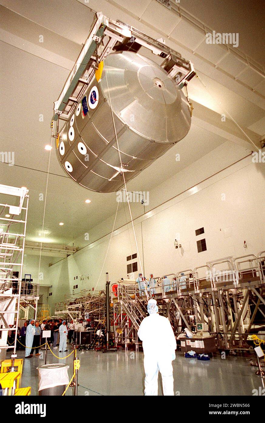 KENNEDY SPACE CENTER, FLA. -- Suspended from an overhead crane in the ...