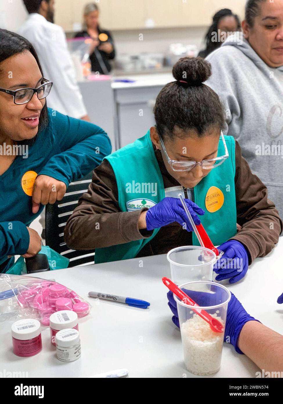 jsc2021e037280 (11/15/2019) --- Girl Scouts prepare experiments as part ...