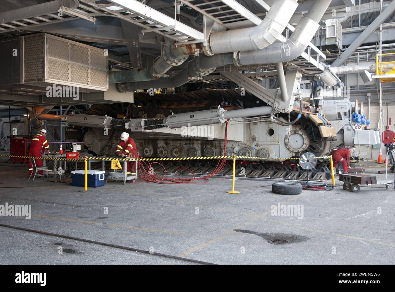 CAPE CANAVERAL, Fla. -- Technicians in the Vehicle Assembly Building at ...