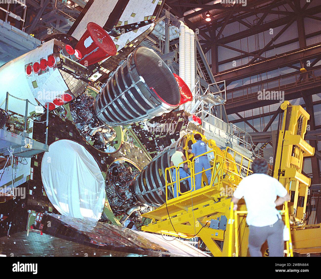 Main engines #1 and #3 are installed in Orbiter Columbia at KSC ...