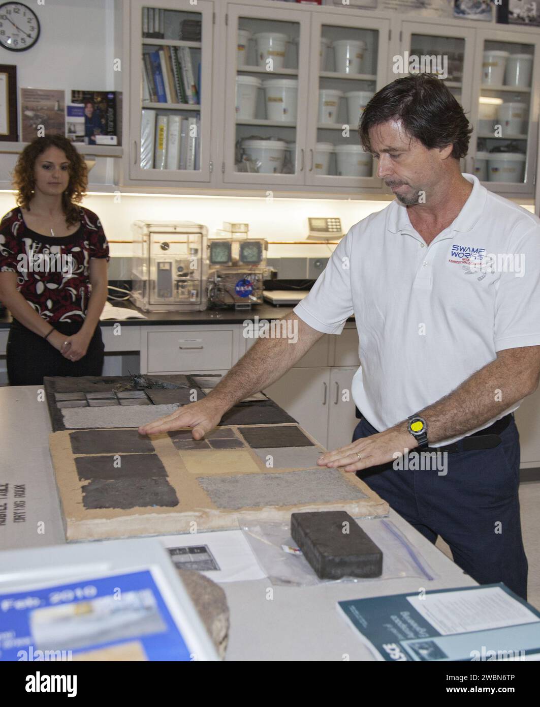 CAPE CANAVERAL, Fla. -- Dr. Phil Metzger, at right, a principal ...