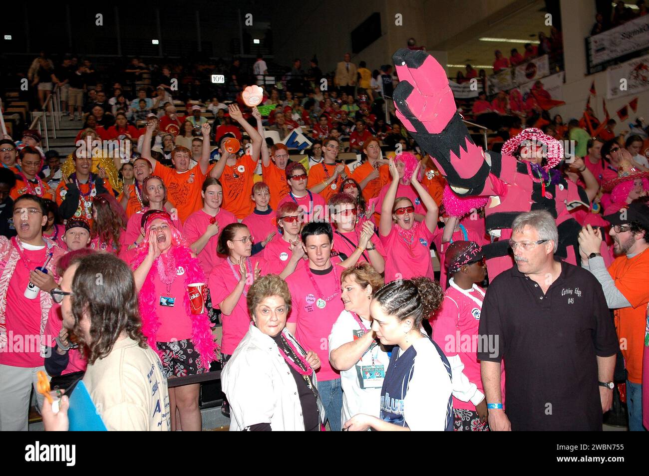 KENNEDY SPACE CENTER, FLA. - Pink T-shirt-clad friends and family cheer ...
