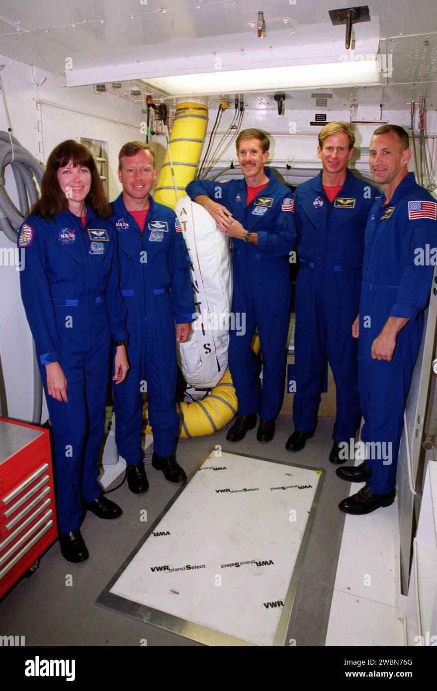 KENNEDY SPACE CENTER, Fla. -- The STS-104 crew pauses during Terminal ...