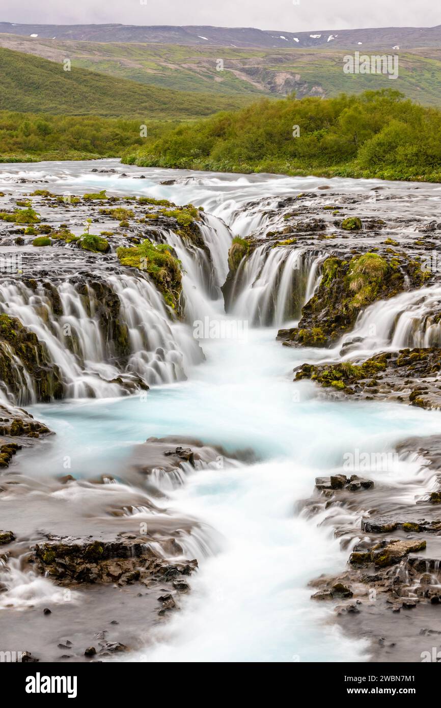 The blue, shallow water of the Bruarfoss waterfall in the Golden Circle ...