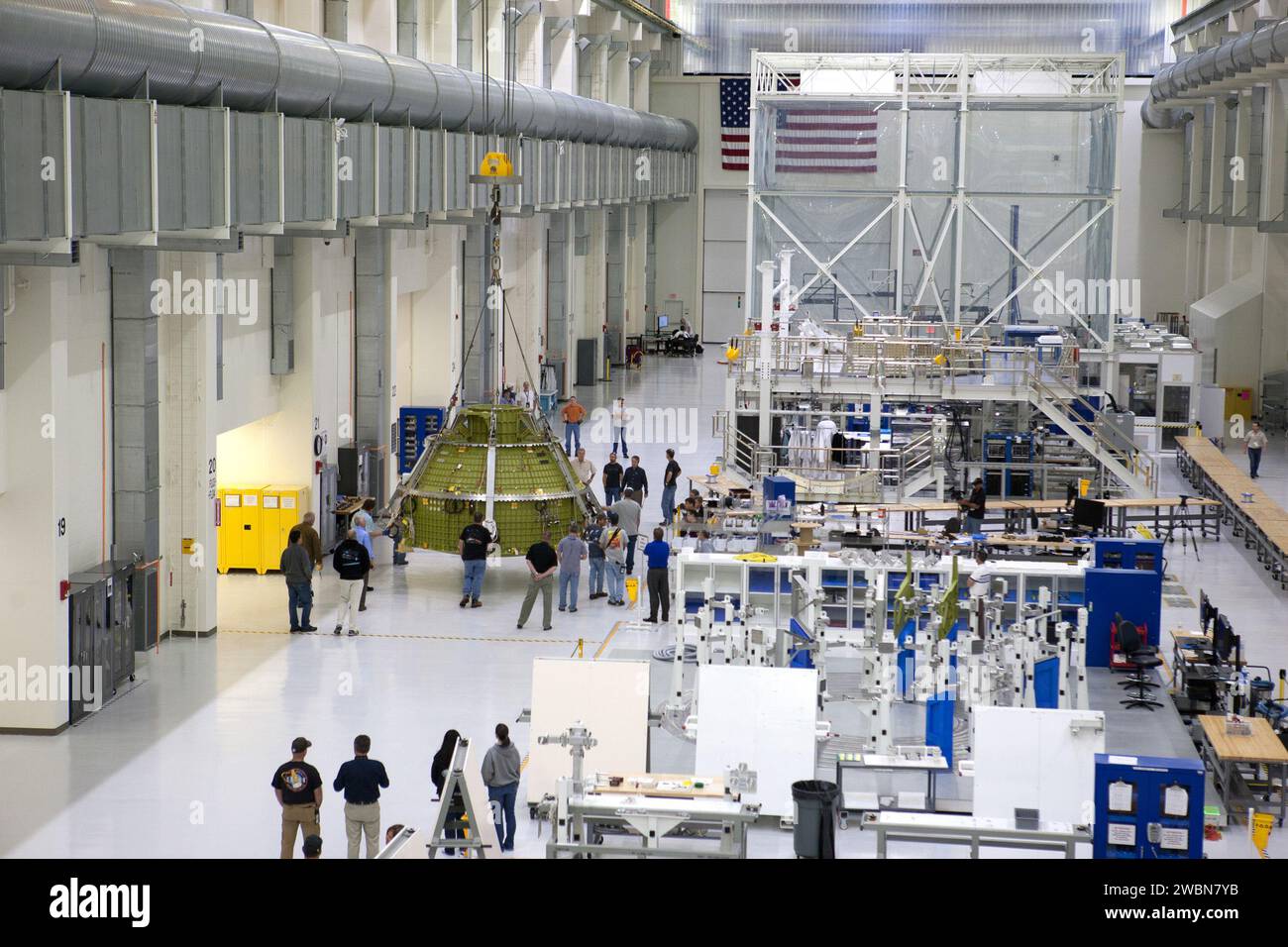 The Orion crew module for Artemis I is lifted into a test stand for ...