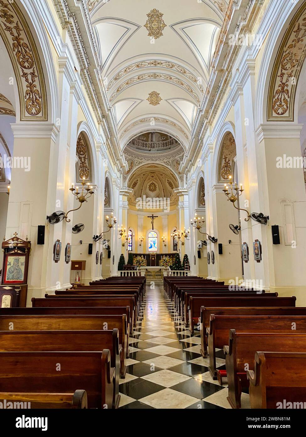 The image depicts a grand and spacious church adorned with an exquisite ...