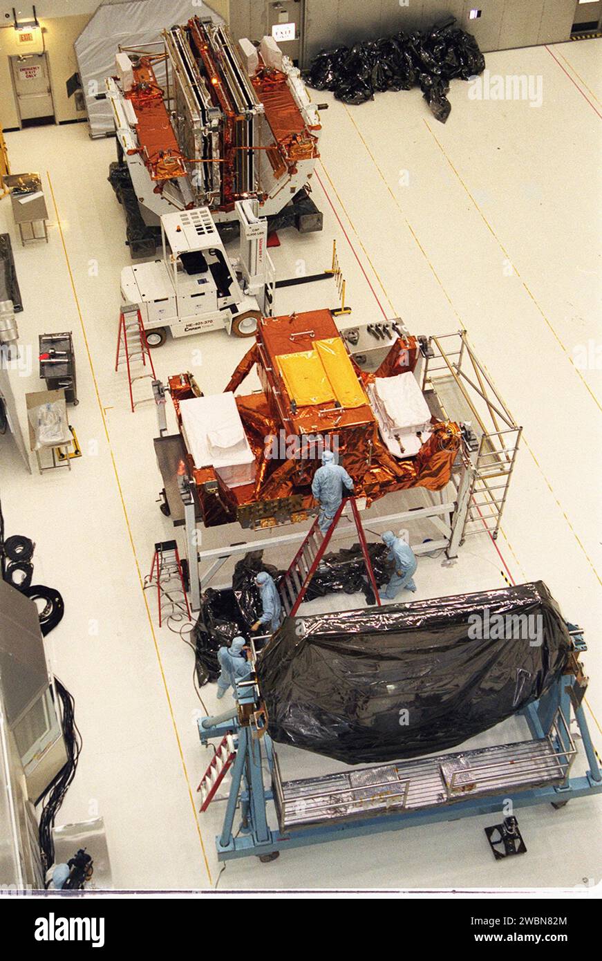 KENNEDY SPACE CENTER, Fla. -- In the Vertical Processing Facility, two ...