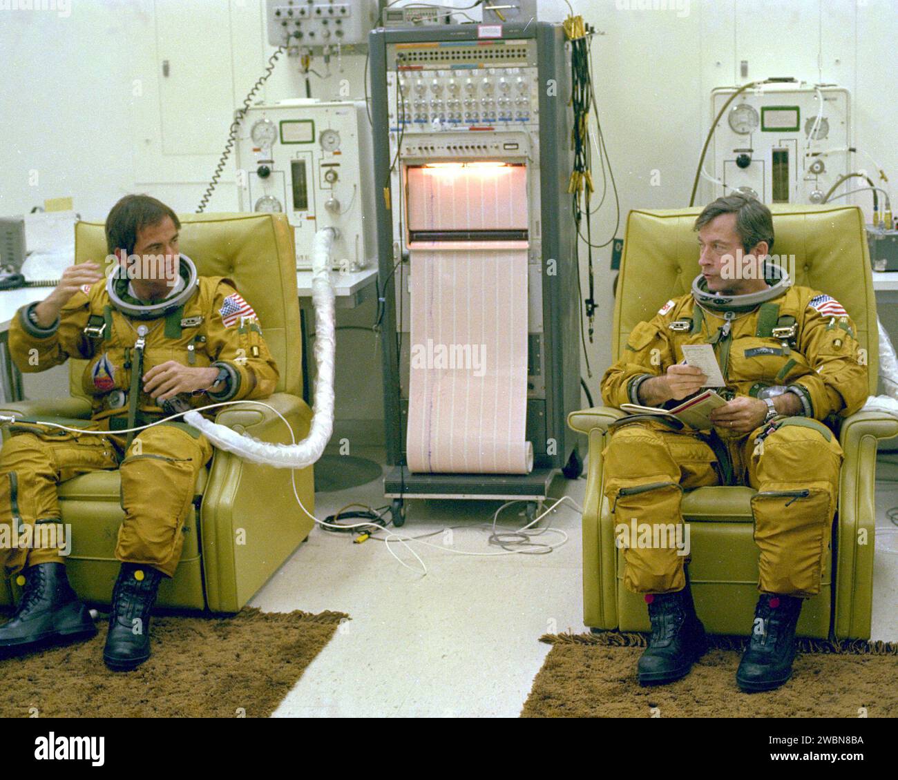 Astronauts Bob Crippen and John Young discussed checklist items during ...