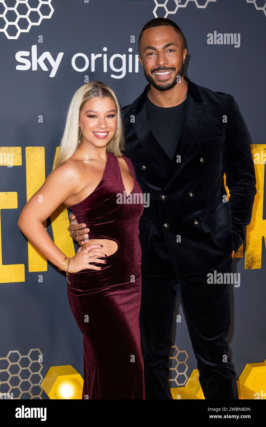 Molly Rainford, left, and Tyler West pose for photographers upon ...