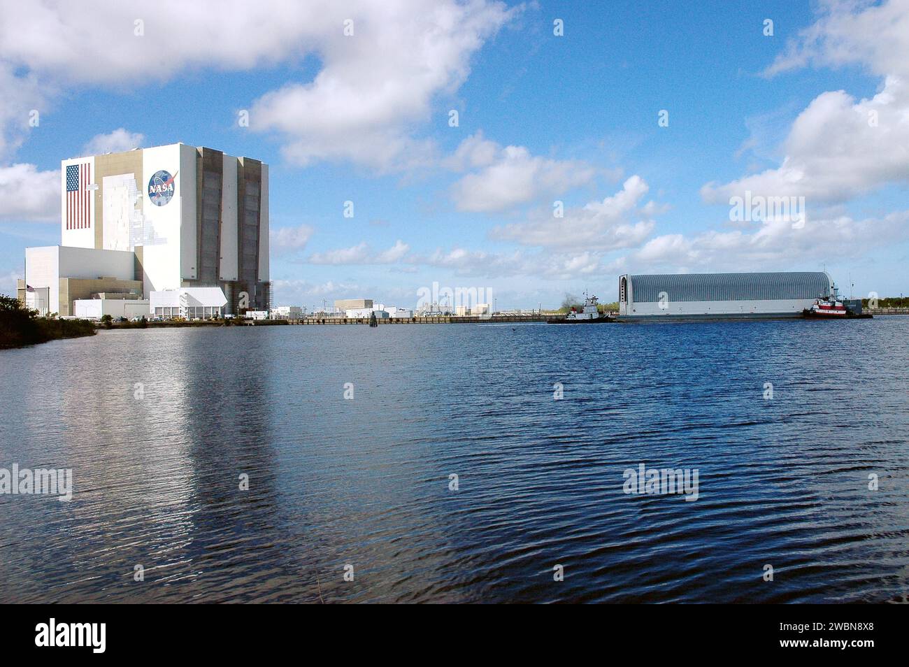The redesigned External Tank for STS-114 is transported by barge from ...