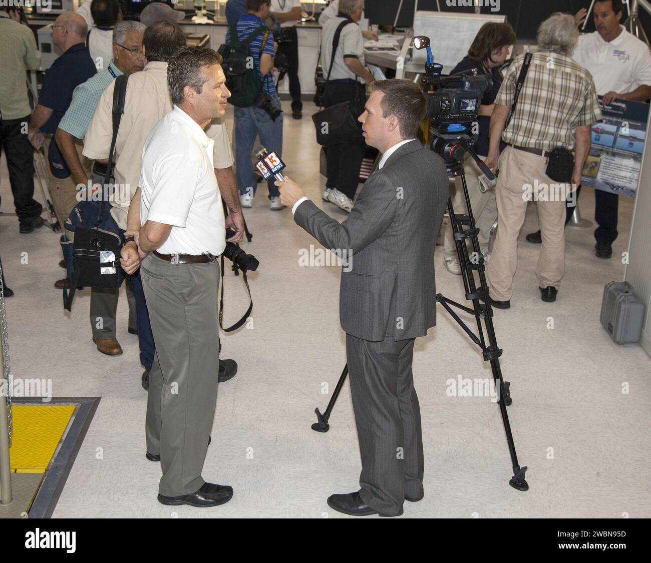 Robert Mueller, chief of the Surface Systems Office, is interviewed ...