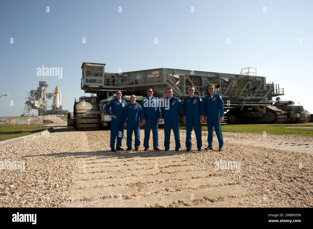 The STS-132 crew posed at Launch Pad 39A in front of the crawler ...