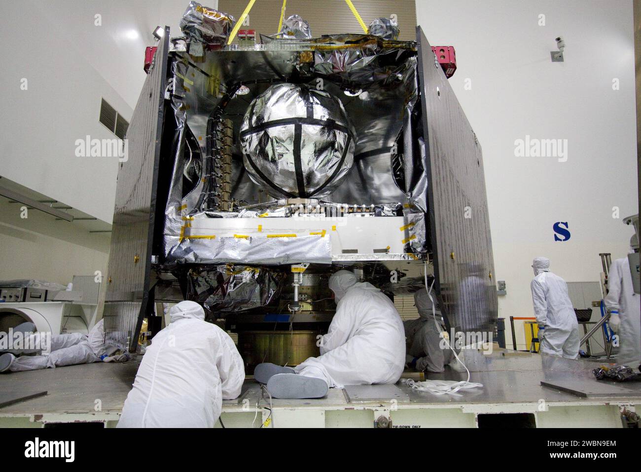 CAPE CANAVERAL, Fla. -- Technicians at Astrotech's payload processing ...