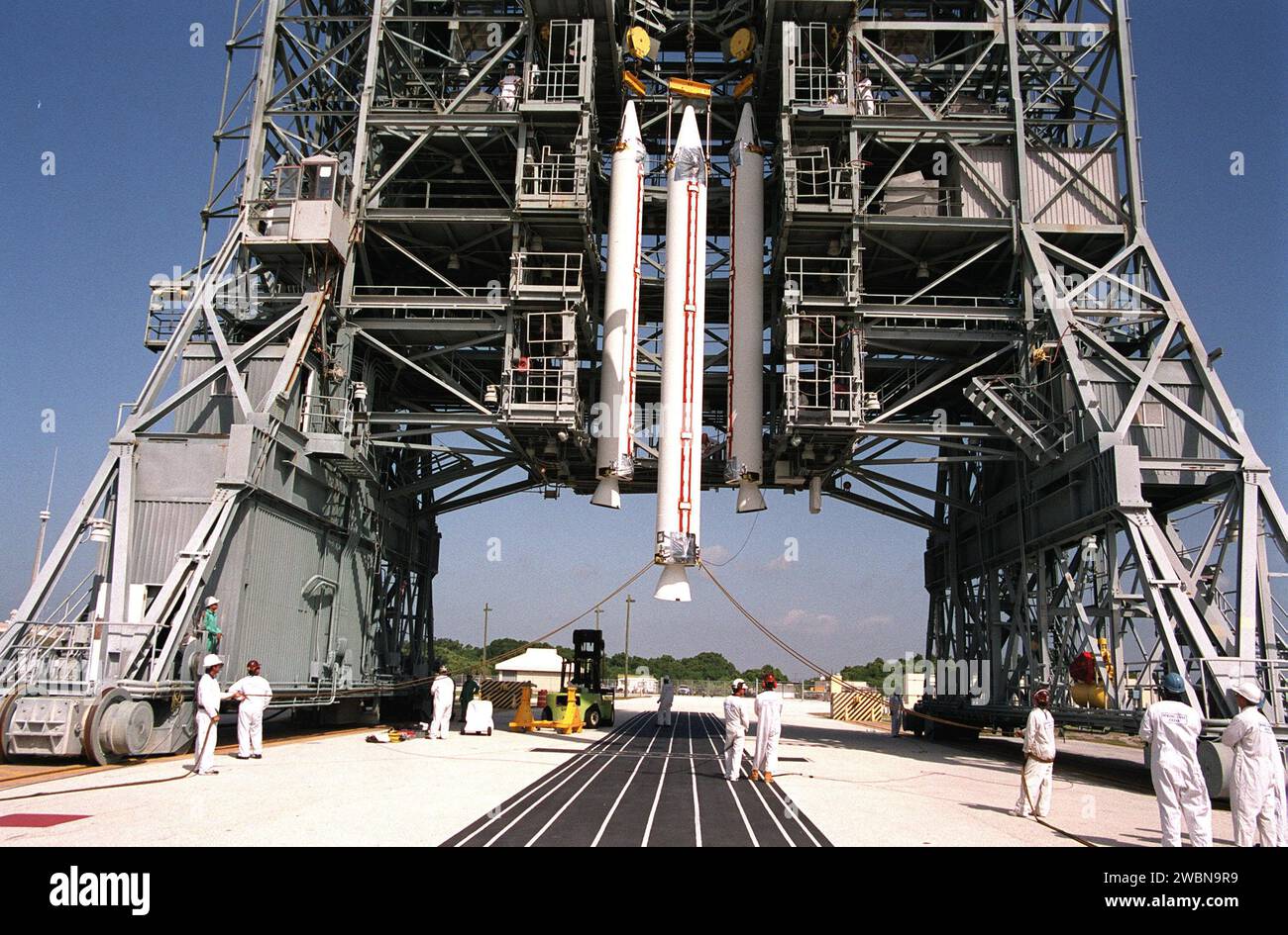 The third solid rocket booster is installed on Launch Complex 17-A for ...