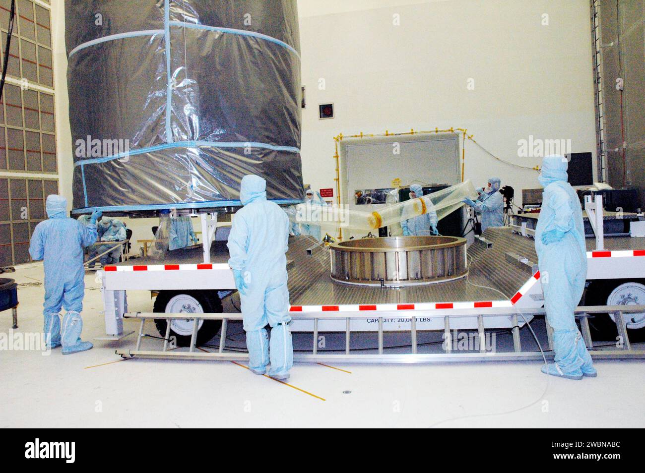 The Swift spacecraft is loaded onto a transport vehicle at Kennedy ...