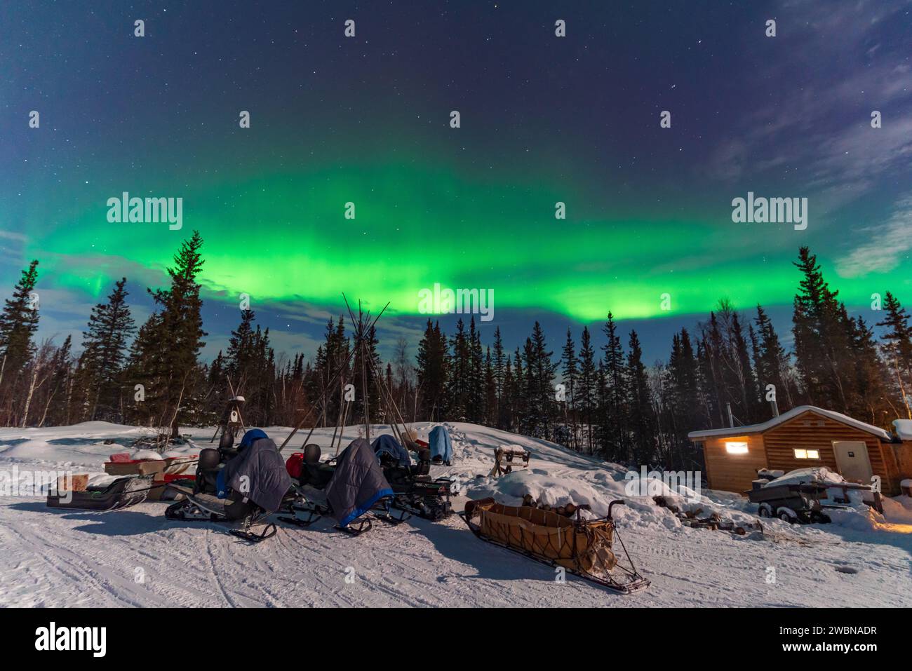 Aurora Borealis, Northern Lights, over aboriginal wooden cabin at ...