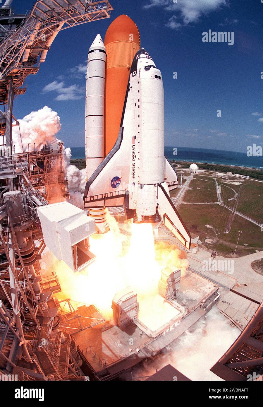 KENNEDY SPACE STATION, FLA. -- Space Shuttle Endeavour hurtles into a ...